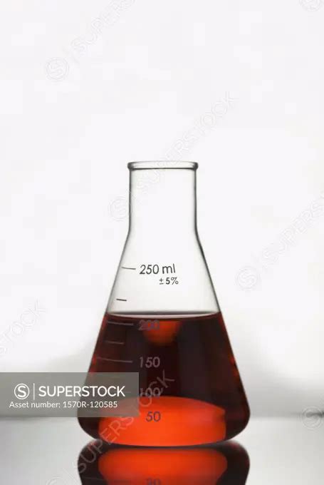 Red Solution In A Conical Flask Superstock