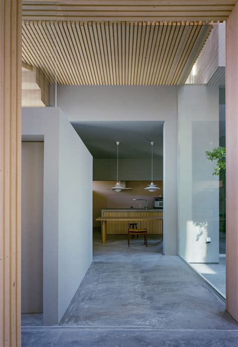 Fujiwaramuro Architects Overlaps Concrete Boxes For House In Tsurumi Ku