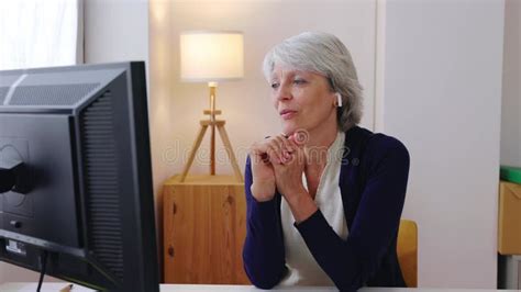 Mature Businesswoman Having Online Video Call On Desktop Pc At Home Office Stock Video Video