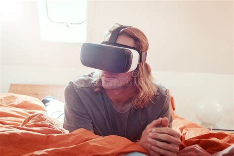 Young Man Lying On Bed With Vr Glasses Stock Image Image Of Face