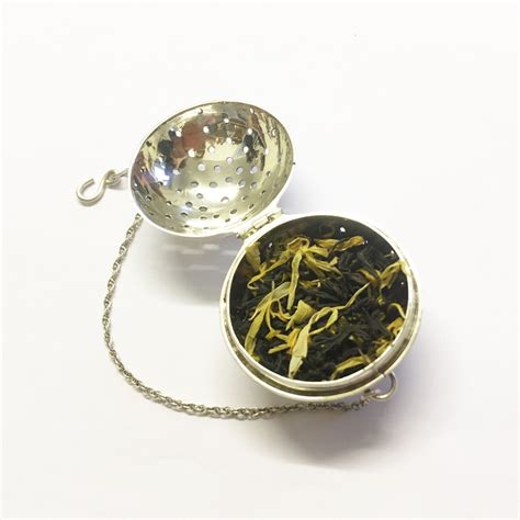 Fabricated Little Tea Ball Formed To Be Spherical Complete With Hinge And Chain — The Silver Duck