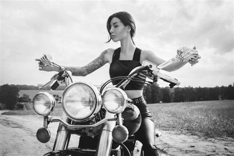 Premium Photo Young Sexy Girl Posing On A Motorcycle At Sunset Motor