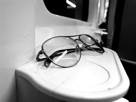 Round Eyeglasses With Thin Metal Frames Rest On A Curved Surface Stock Image Image Of Curved