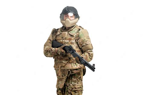 Premium Photo American Commando In Uniform With A Shotgun On A White Background