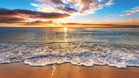 Download Vibrant Beach Sunrise Landscape Wallpaper