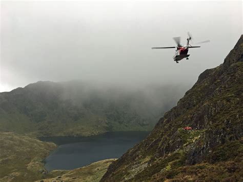 Walkers trapped on Cader Idris in atrocious weather saved in seven-hour rescue operation ...