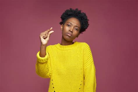 Premium Photo Disappointed Upset African American Woman Showing Small