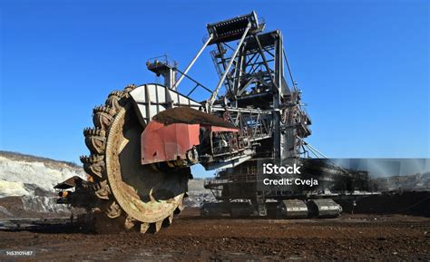 Bucketwheel Excavator During Excavation At The Surface Mine Huge