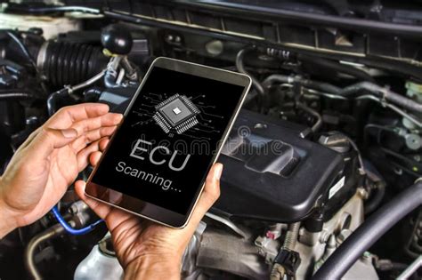 Technician Checking The Car Electronic Control Unit System Or Ecu With