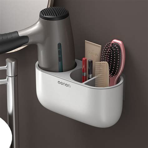 Тримачі для фену