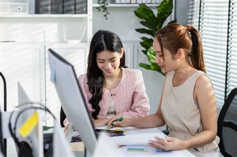 Asian Two Woman Business Office Discussing Financial Accounting Using Tablet Working Company