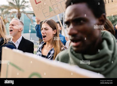 Group Of Activist Demonstrating Against Global Warming And Climate