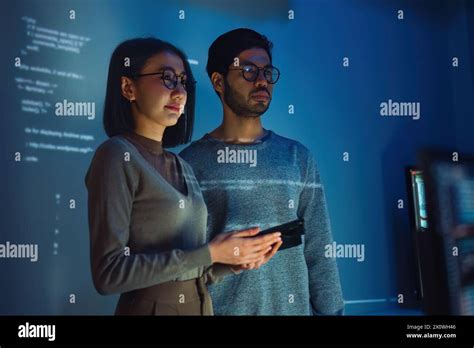 Two Asian And Indian Developer Presentation About Coding Software Data