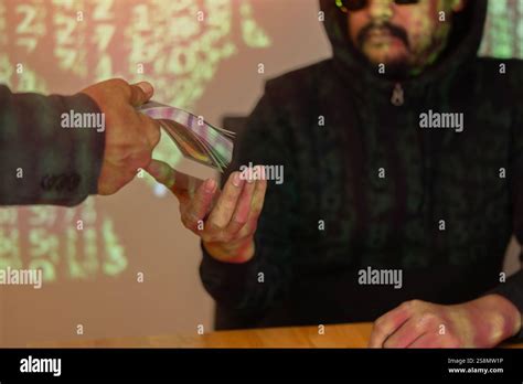 Hacker In A Sunglasses With Laptop Receive Money From Employers Secretly Over Green Binary Code