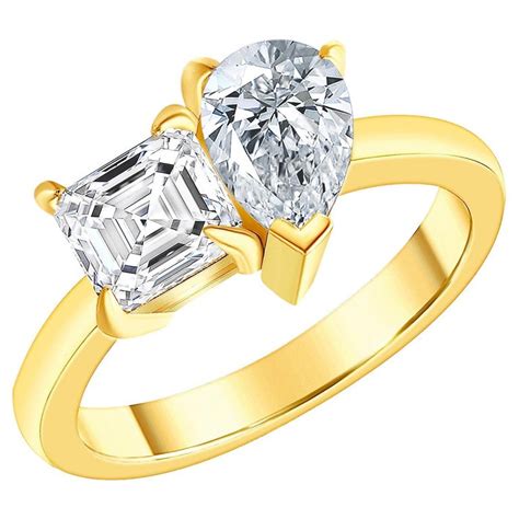Customizable Toi Et Moi Asscher And Pear Cut Diamond Engagement Ring 1