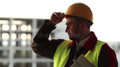builder with work documentation on project site stock footage video