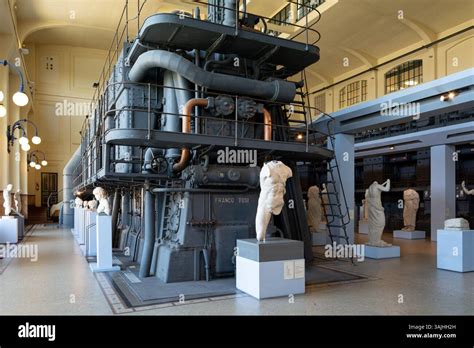 Roman Marble Statue Of A Warrior In Front Of Electricity Generator