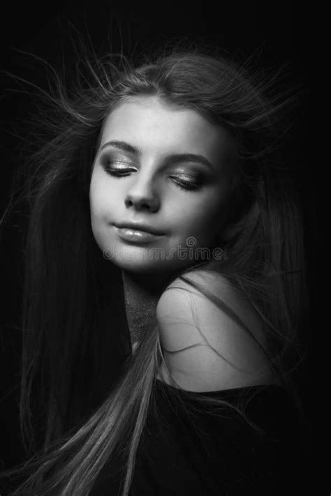 Black And White Portrait Of A Stunning Woman With Bare Shoulders Stock