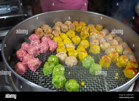 Steamed Multi Colored Dumplings Showcased In A Street Food Market In