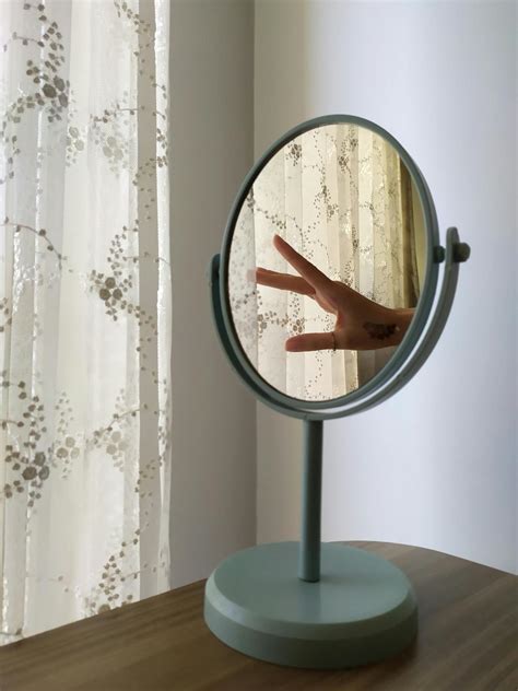 mirror reflection memory hand on window fade into light photos