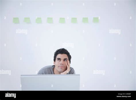 Man Thinking At Computer Stock Photo Alamy
