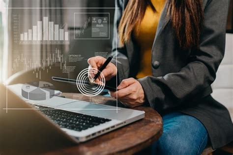 Premium Photo Designer Using Tablet And Document Searching For Information On Desk