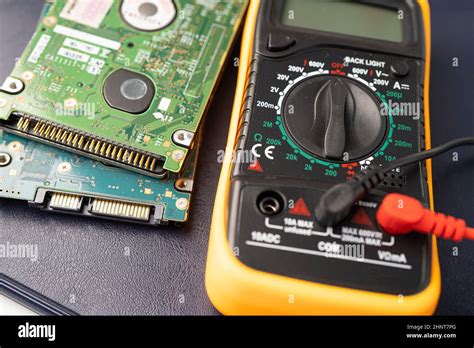 Multimeter With Main Board Maintenance Repairing And Checking Computer Hardware Concept Stock