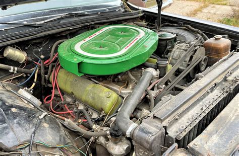 Бензиновый двигатель V8 500 серии имел максимальную мощность 220 л. с ...
