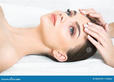 Face Massage Close Up Of A Young Woman Getting Spa Treatment Stock
