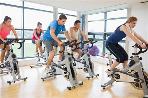 Determined People Working Out At Spinning Class Stock Image Image Of