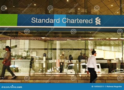 Standard Chartered Among Citizens Passing Activity Editorial Photo