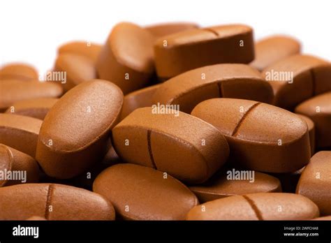 Pile Of Brown Tablets Pills Prescription Drugs Pharmaceutical
