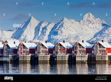 Rorbuer cottages in harbour at Svolvaer / Svolvær in snow in winter ...