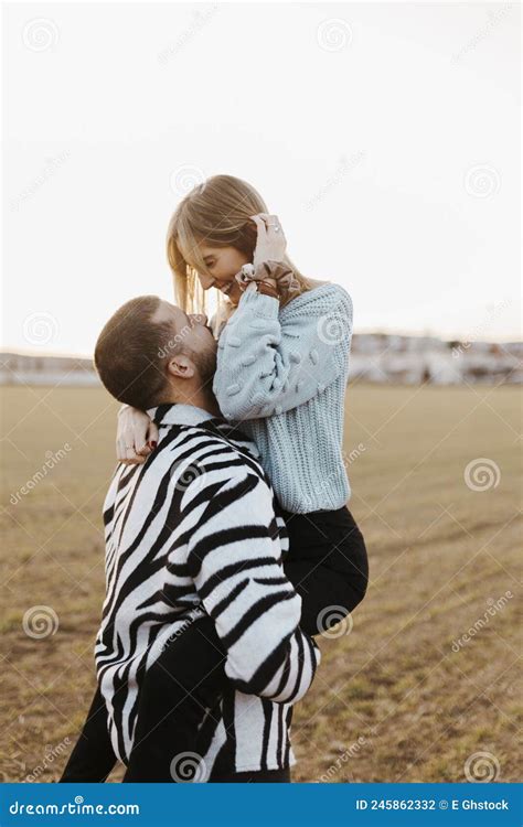 Boyfriend Pick Up His Girlfriend Couple In Love In The Countryside Embraced Stock Photo Image