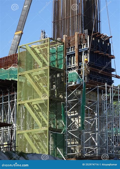 Installation Of Temporary Scaffolding For The Construction Of Tall