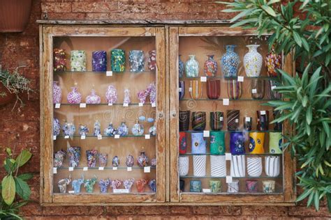 A Showcase With Handmade Glass Products Glass Vases And Glasses For Sale In A Souvenir Shop In