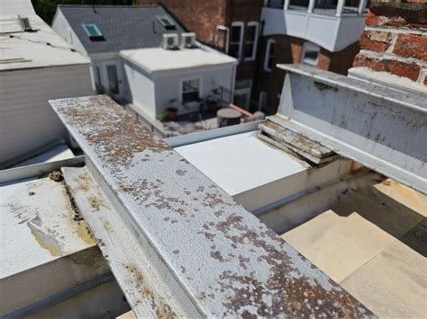 Leveling And Separating Steel I Beams On Rooftop Copings Dupont Roofing Dc