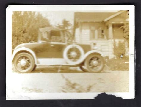 Vintage 1920s Or 1930s Snapshot Ford Model A Automobile With Spare Tire