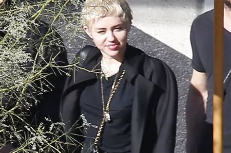 Miley Cyrus Continues To Ignore Sex Tape Scandal As She Attends Business Meeting Without