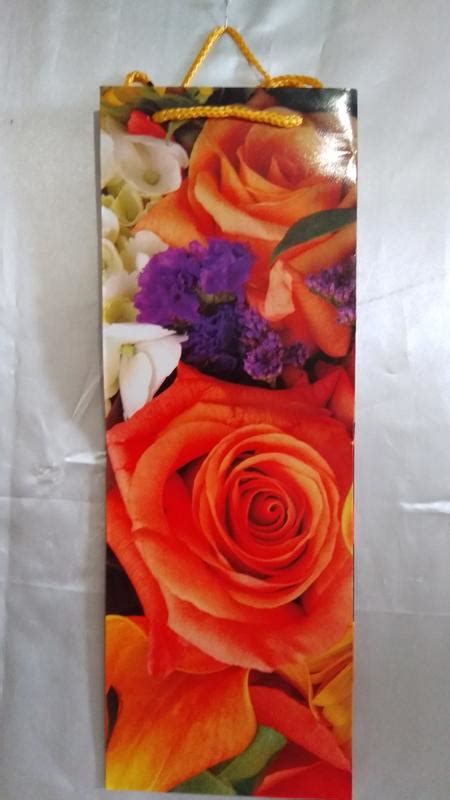 Подарунковий пакет під пляшку квіти — ціна 32 грн у каталозі Пакети Купити товари для дому та