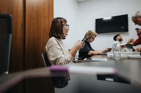 Multicultural Team Collaborating On Business Project In Modern Office