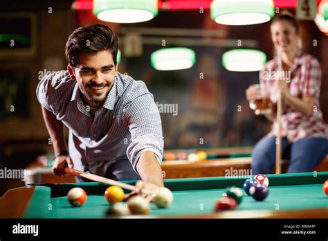 Billiard Game Smiling Man Playing Snooker In Club Stock Photo Alamy