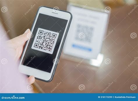 Woman Hand Paying With Qr Code Close Up Of Customer Hand Making Payment Through Smart Phone