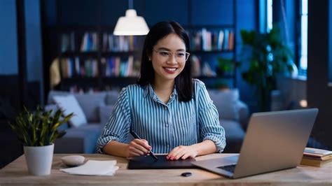 Premium Photo Cheerful Young Graphic Designer Lady Using Digital Graphic Tablet While Working