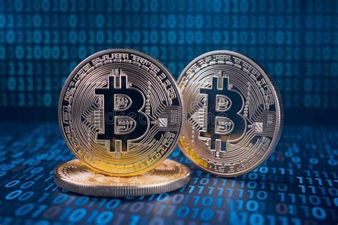 Two Gold Bitcoin Coins With Binary Backdrop Symbolizing Digital