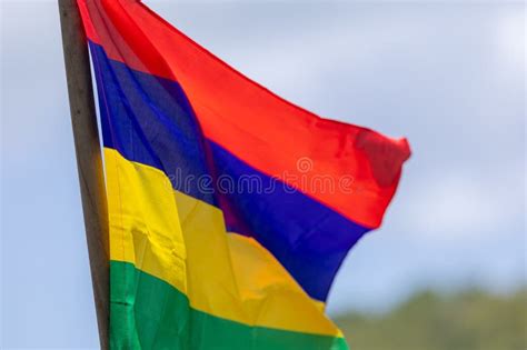 The National Flag Of Mauritius Flutters On The Lawn Stock Image Image