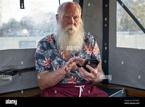 Portrait Of 76 Year Old Man Now Living Contented Aboard A Narrow Boat