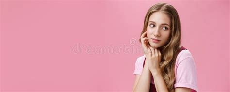 Dreamy Sensual And Feminine Young Pretty Woman With Wavy Natural Hair And Tender Look Feeling