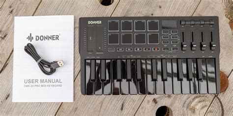 Donner DMK25 Pro Mini Midi Controller Knobs Sliders Keys And Pads Galore