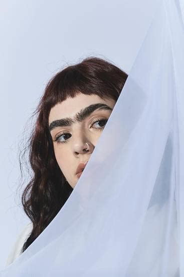 Woman With Monobrow Photos By Canva